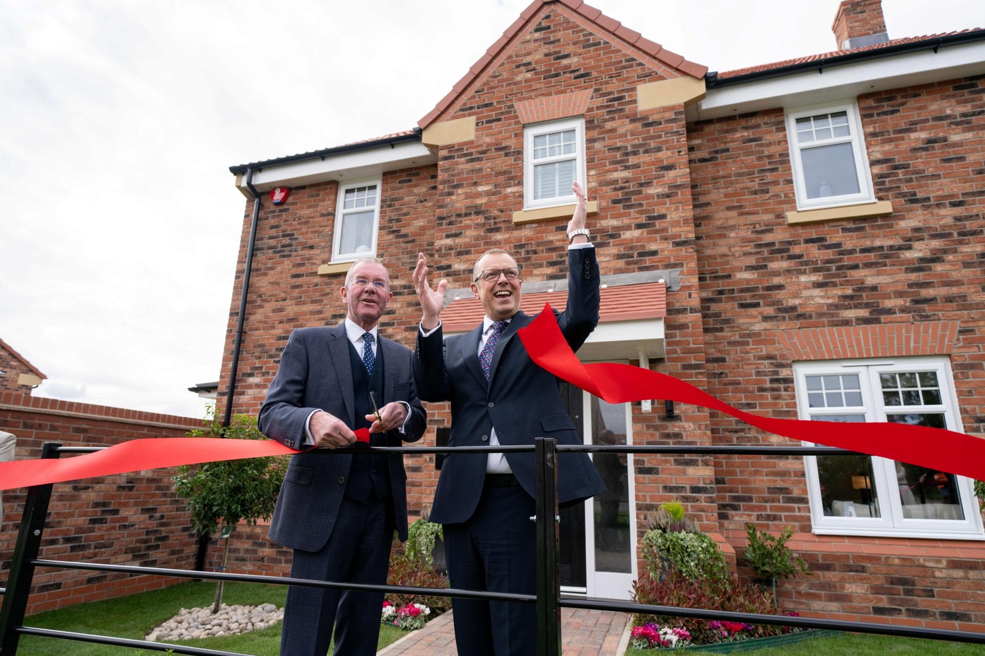 Chair of the Parish Council cuts ribbon at brand new Wetwang showhome ...
